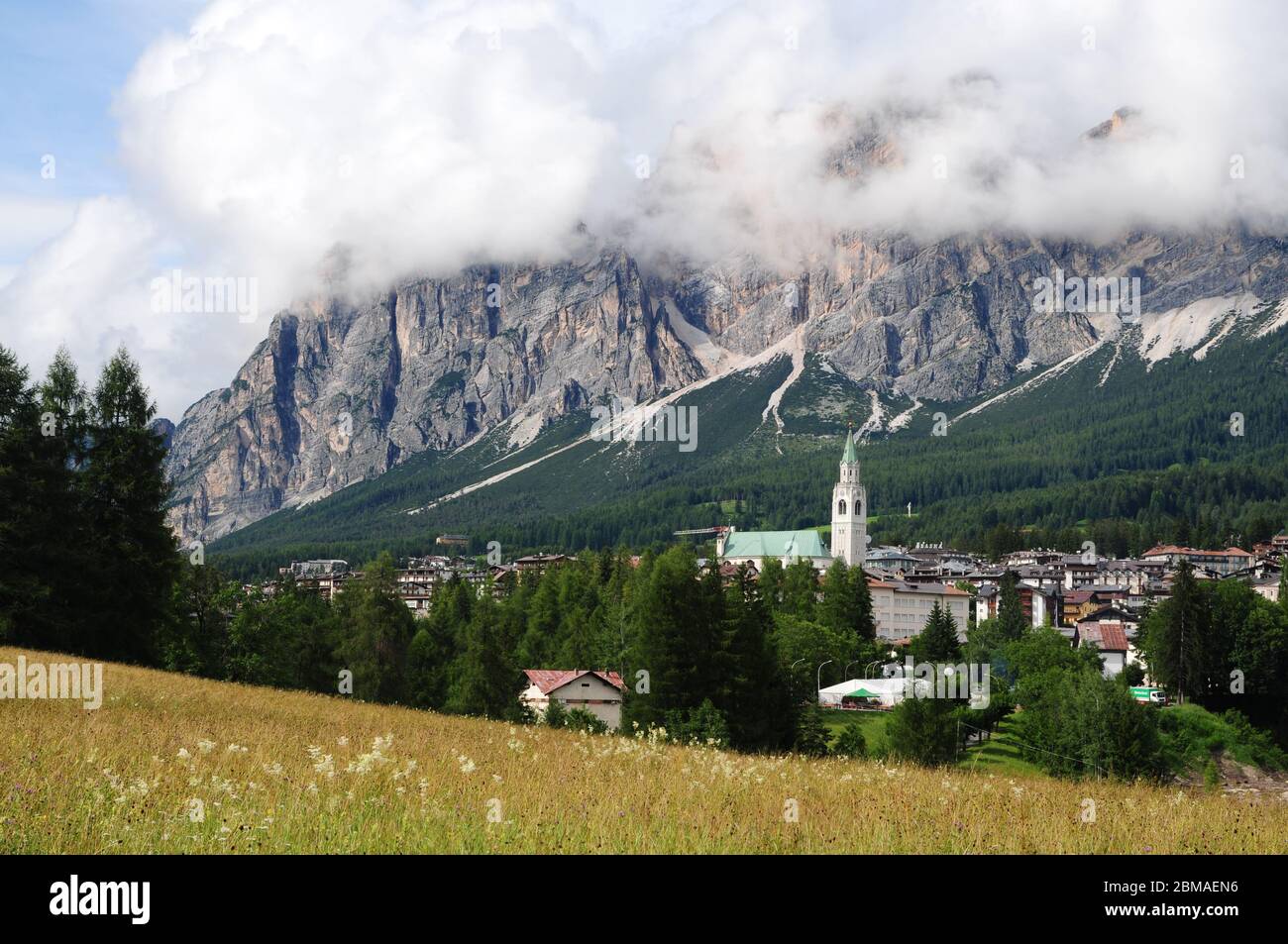 The town of Cortina nestles in the mountains of the Italian Dolomites ...