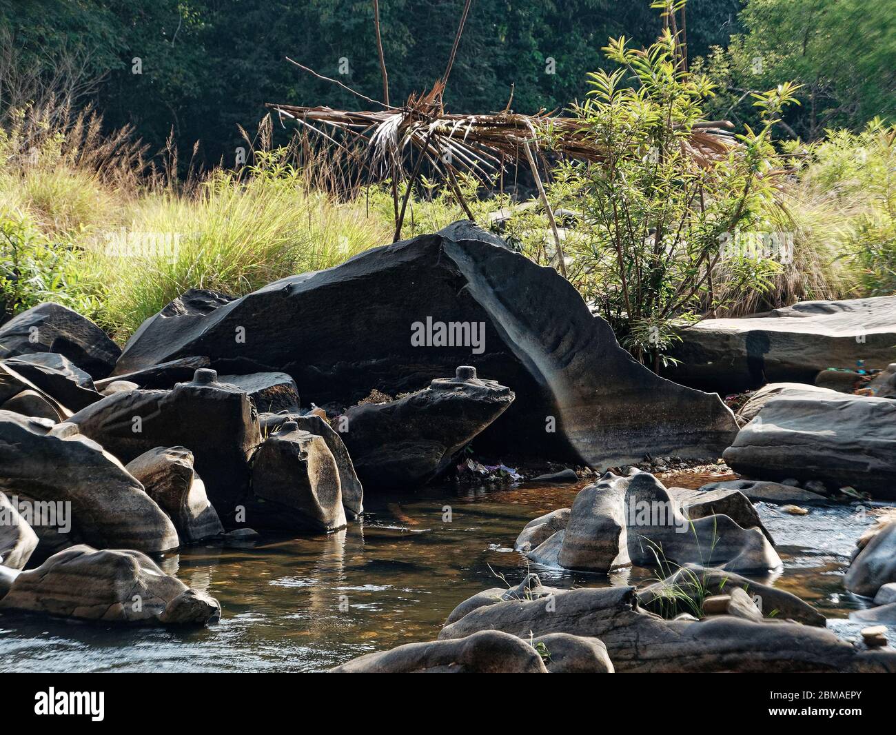 Thousands of shivlingas appearing in Shalmala river bed due to global ...