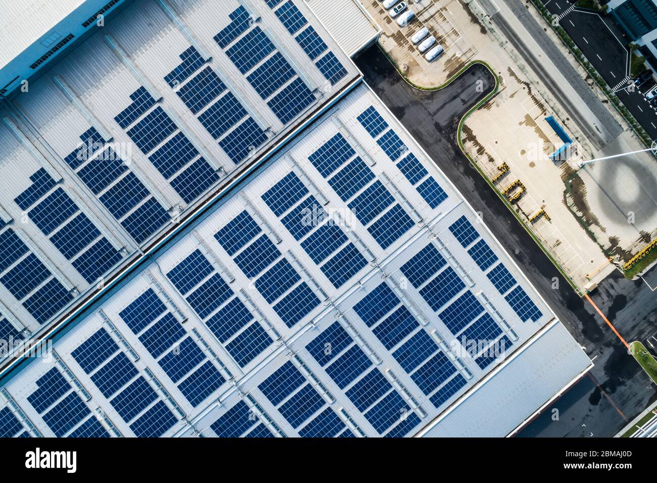 aerial view of factory roof with solar panels Stock Photo - Alamy