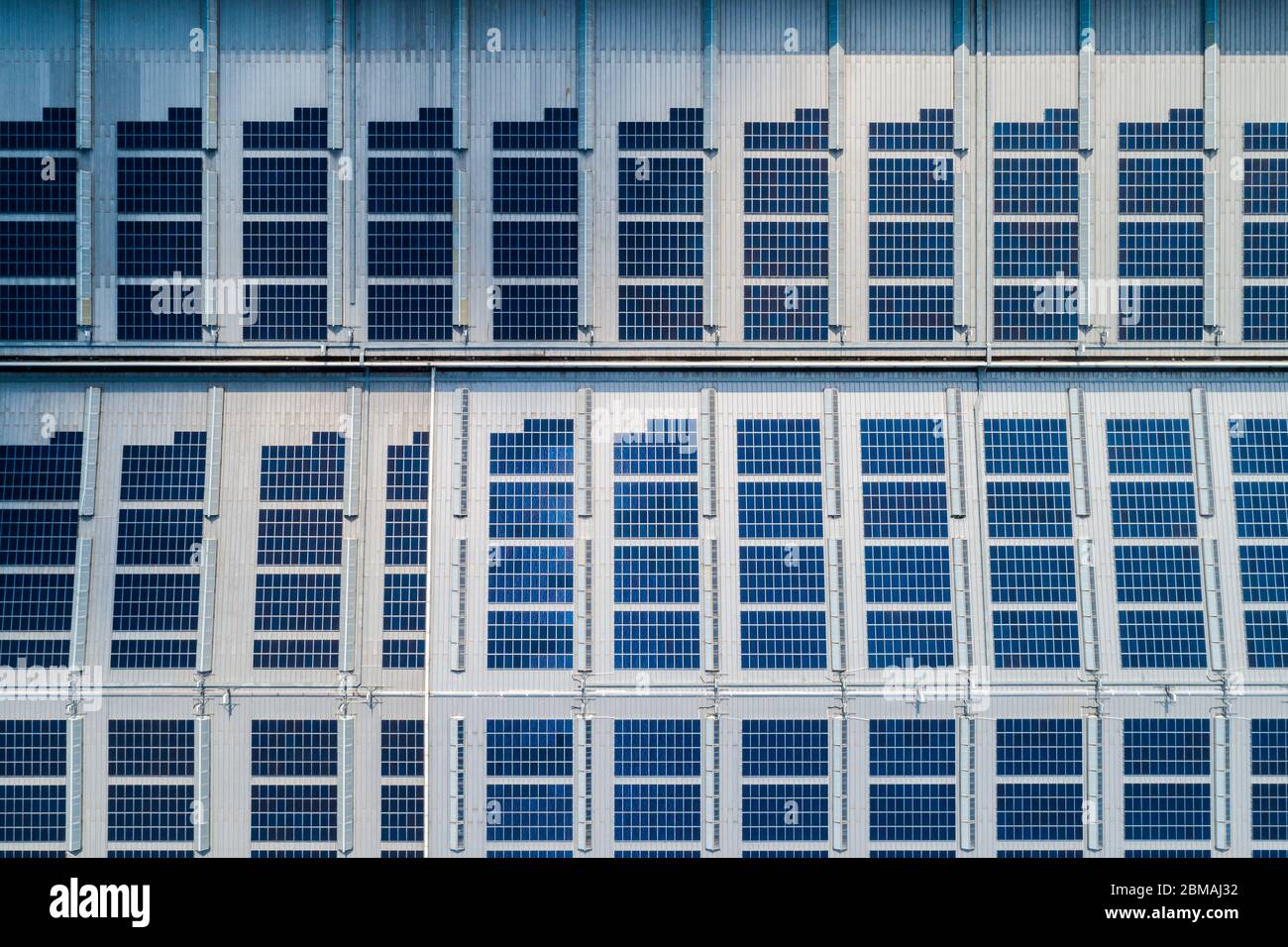 aerial view of factory roof with solar panels Stock Photo - Alamy