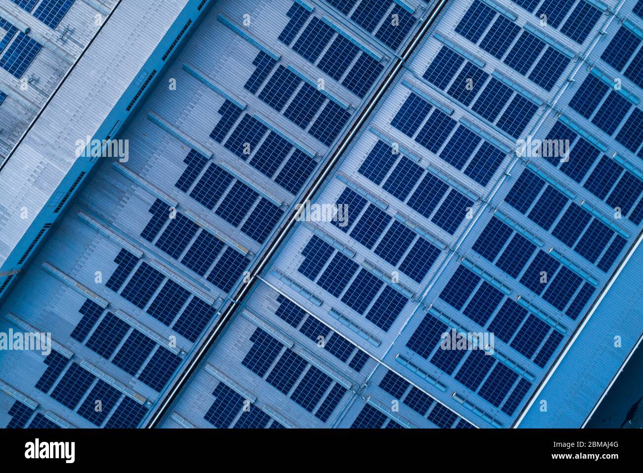 aerial view of factory roof with solar panels Stock Photo - Alamy