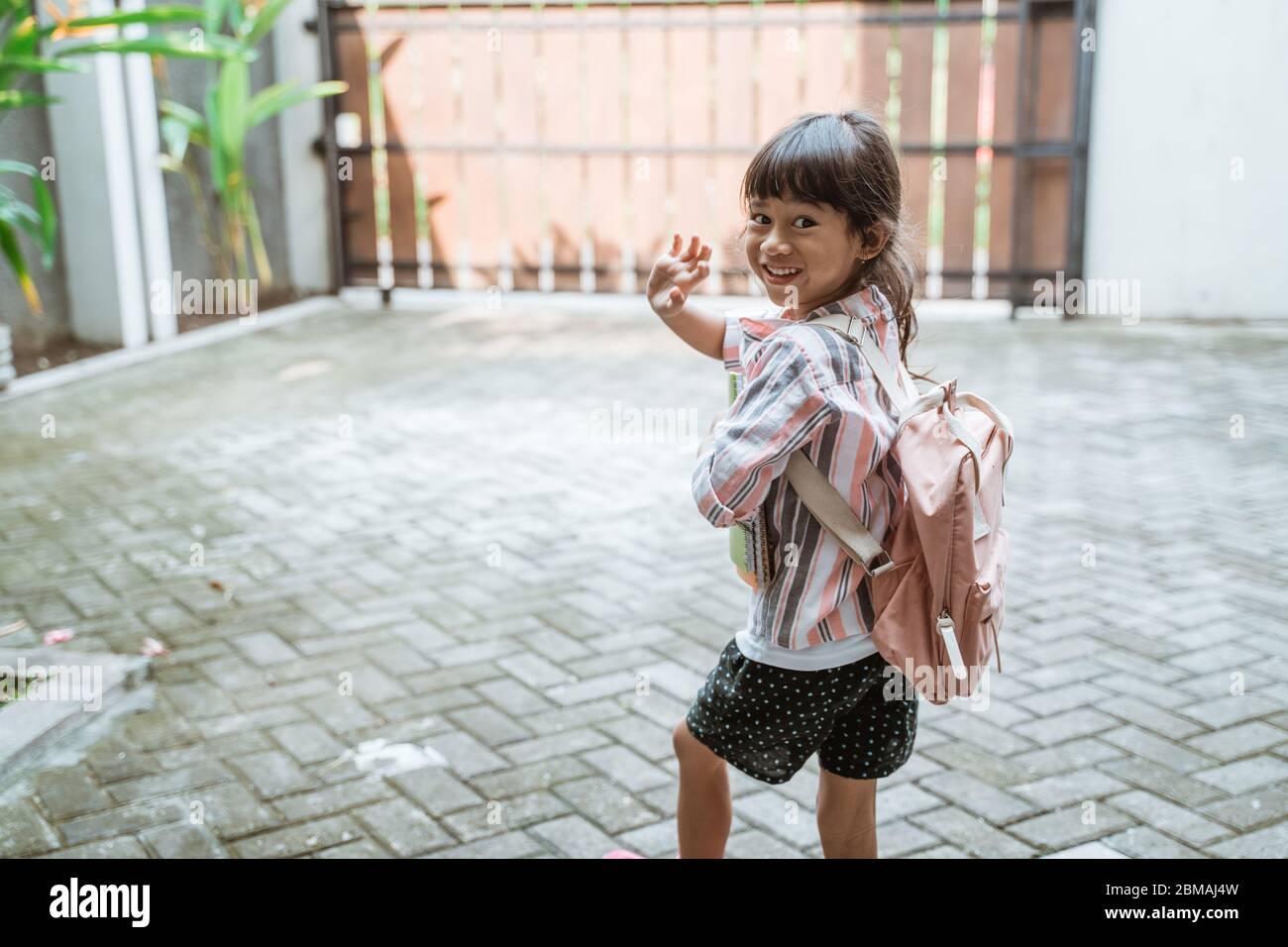 Kids Waving Goodbye At School