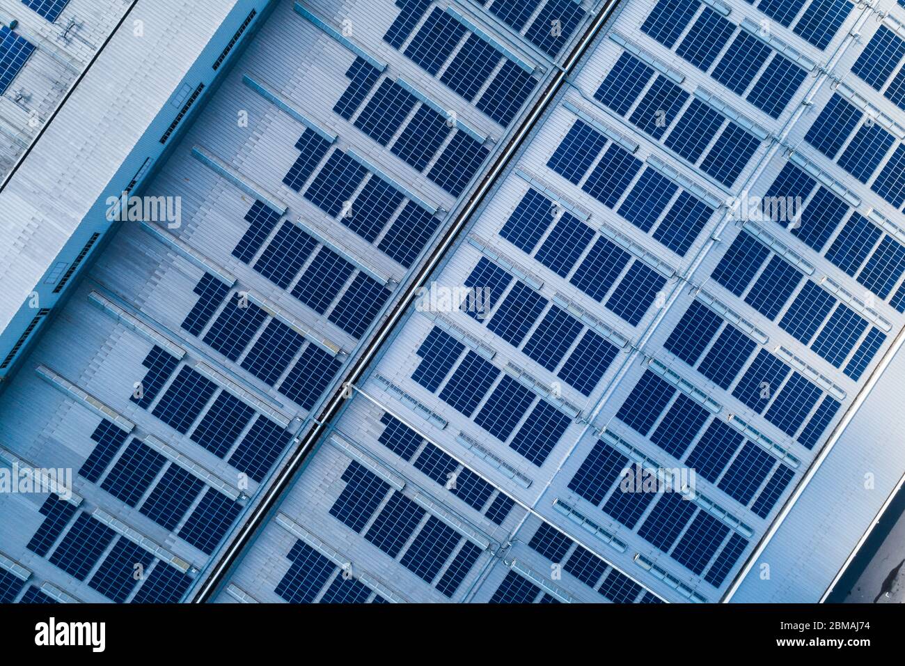 aerial view of factory roof with solar panels Stock Photo - Alamy