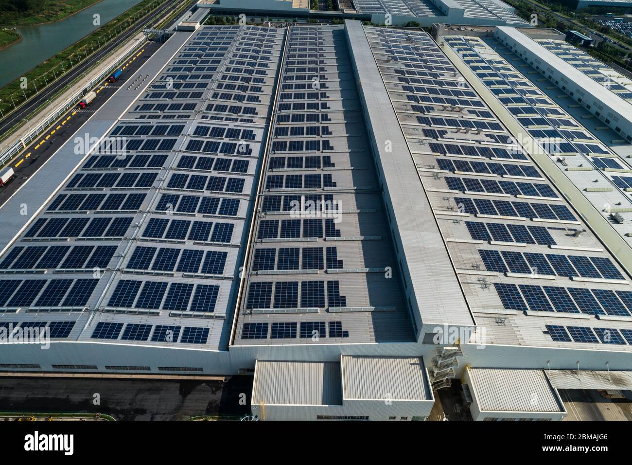 aerial view of factory roof with solar panels Stock Photo - Alamy