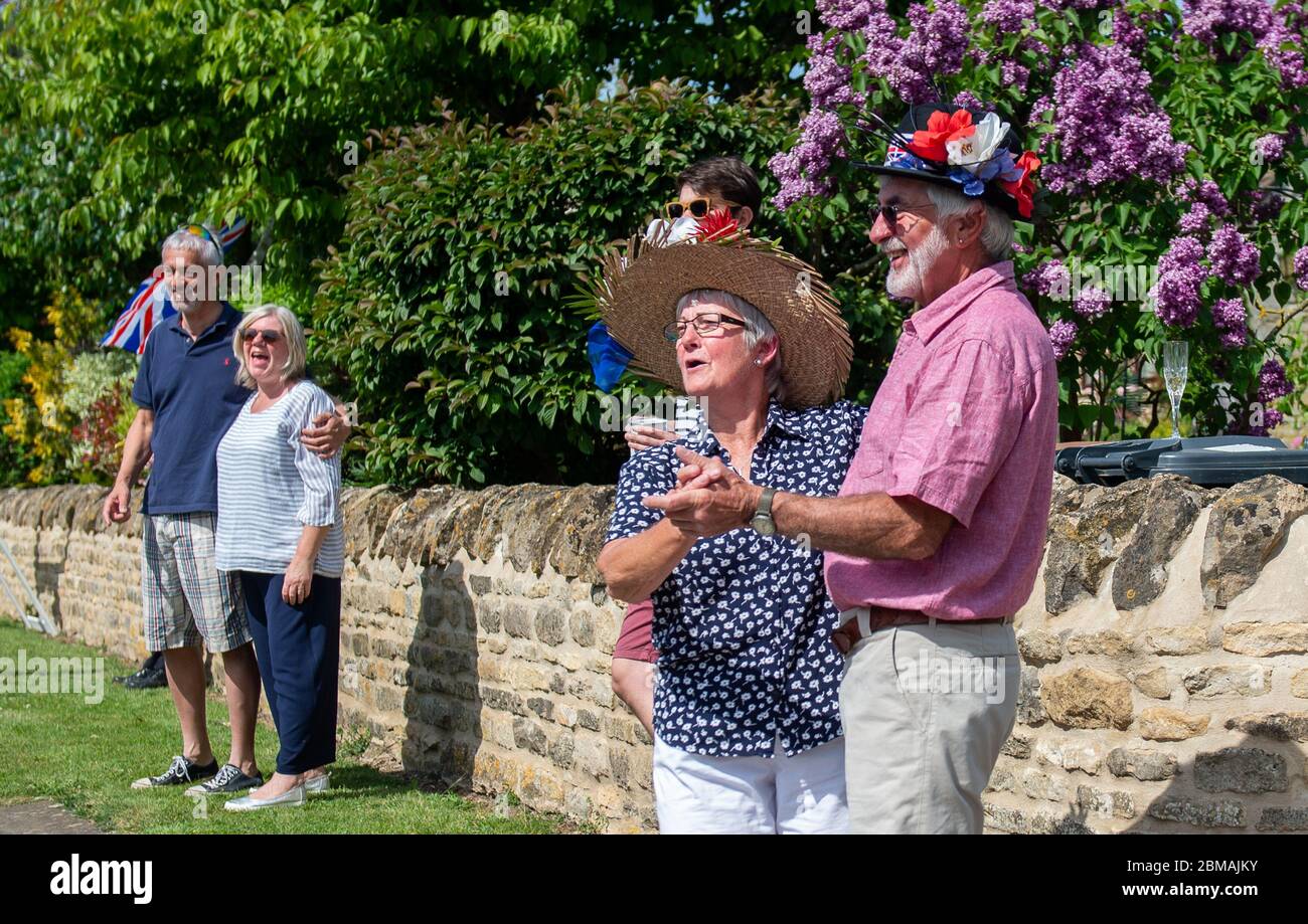 John and Kate Conder dance outside their house in Helpston near ...