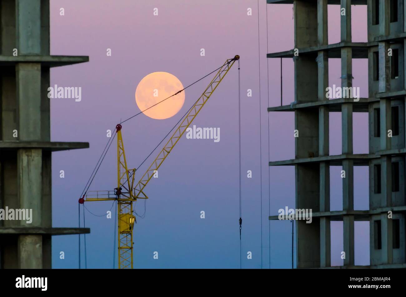 Moon and a crane hi-res stock photography and images - Alamy