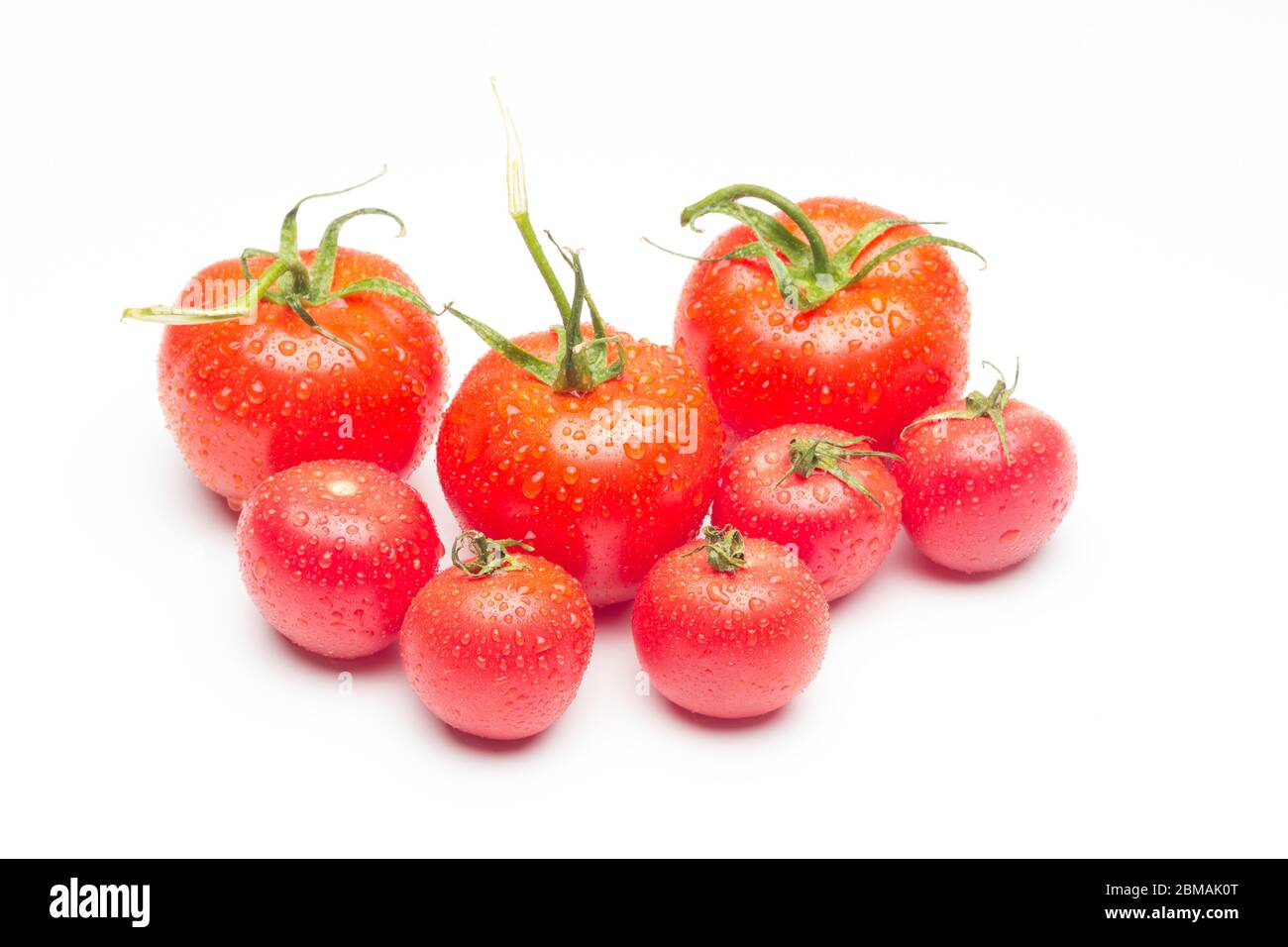 Tomatoes and apples, red fruits, for salads to eat raw, full of ...