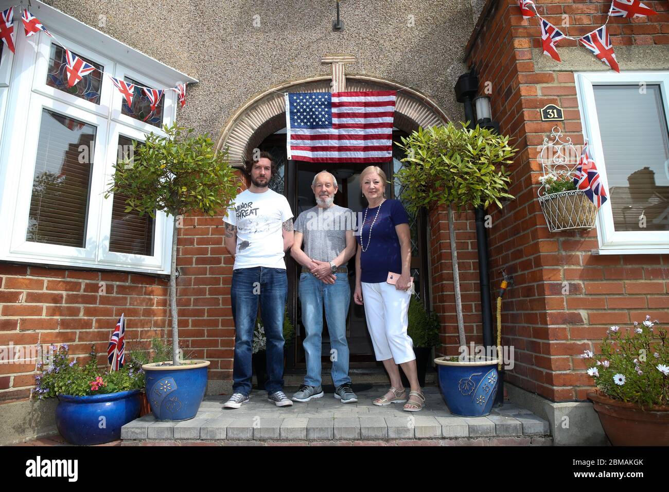 London, UK. 8th May 2020 War baby, Jim Van Sickle (centre) with his ...