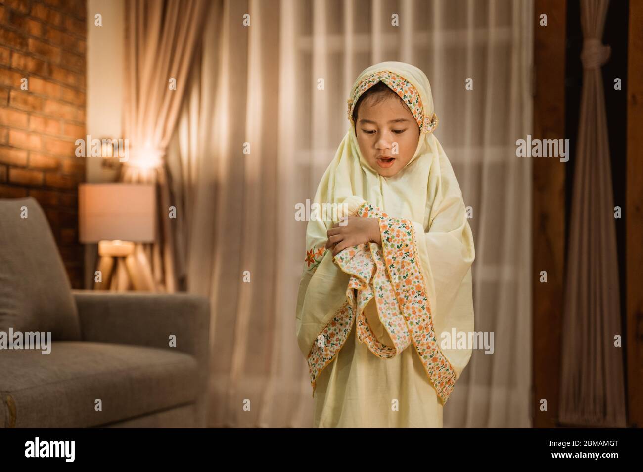 Muslim woman pray home evening hi-res stock photography and images - Alamy