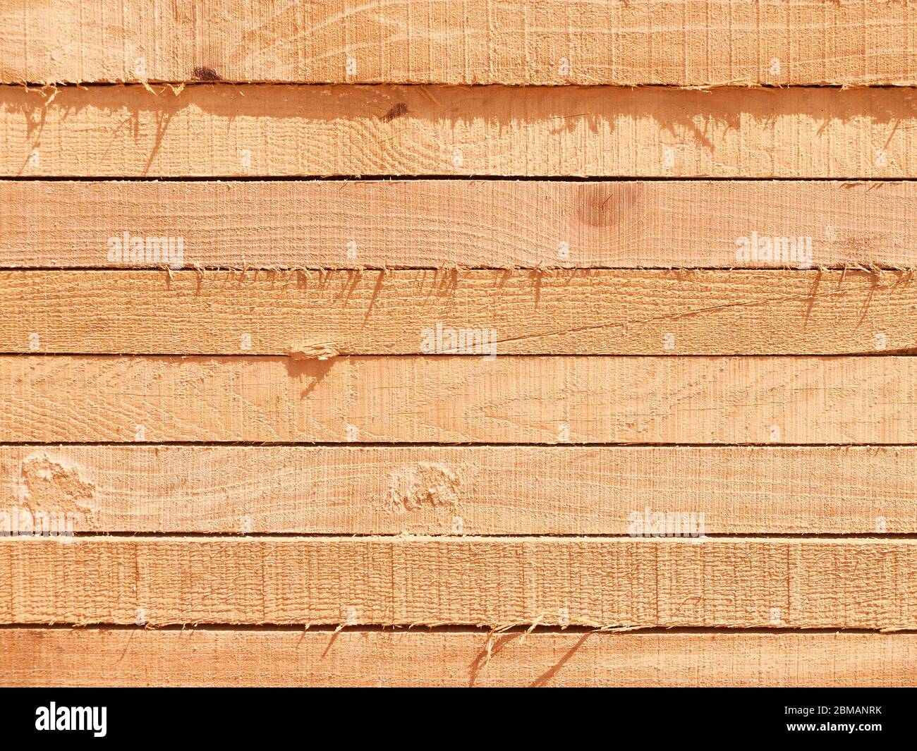 Stack of lumber boards background or texture concept Stock Photo - Alamy