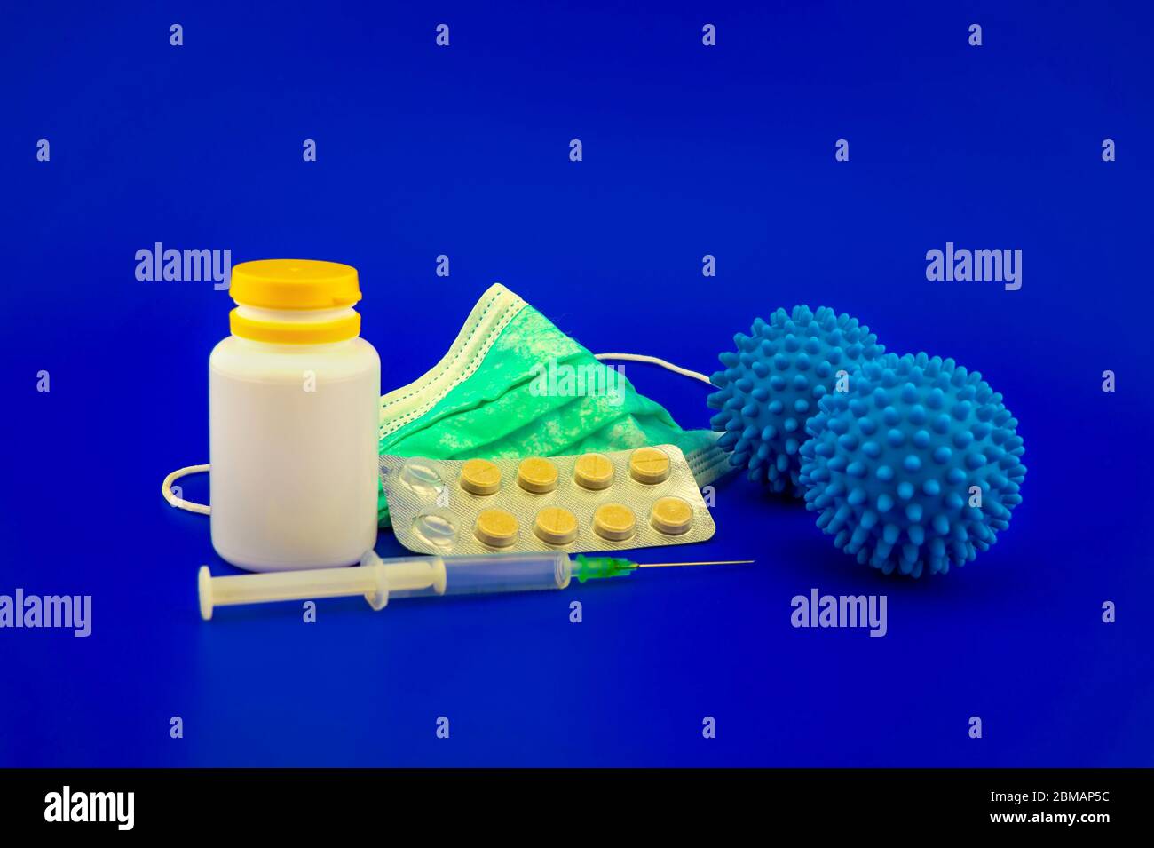 Virus pandemic and possible vaccine concept with surgical mask ...