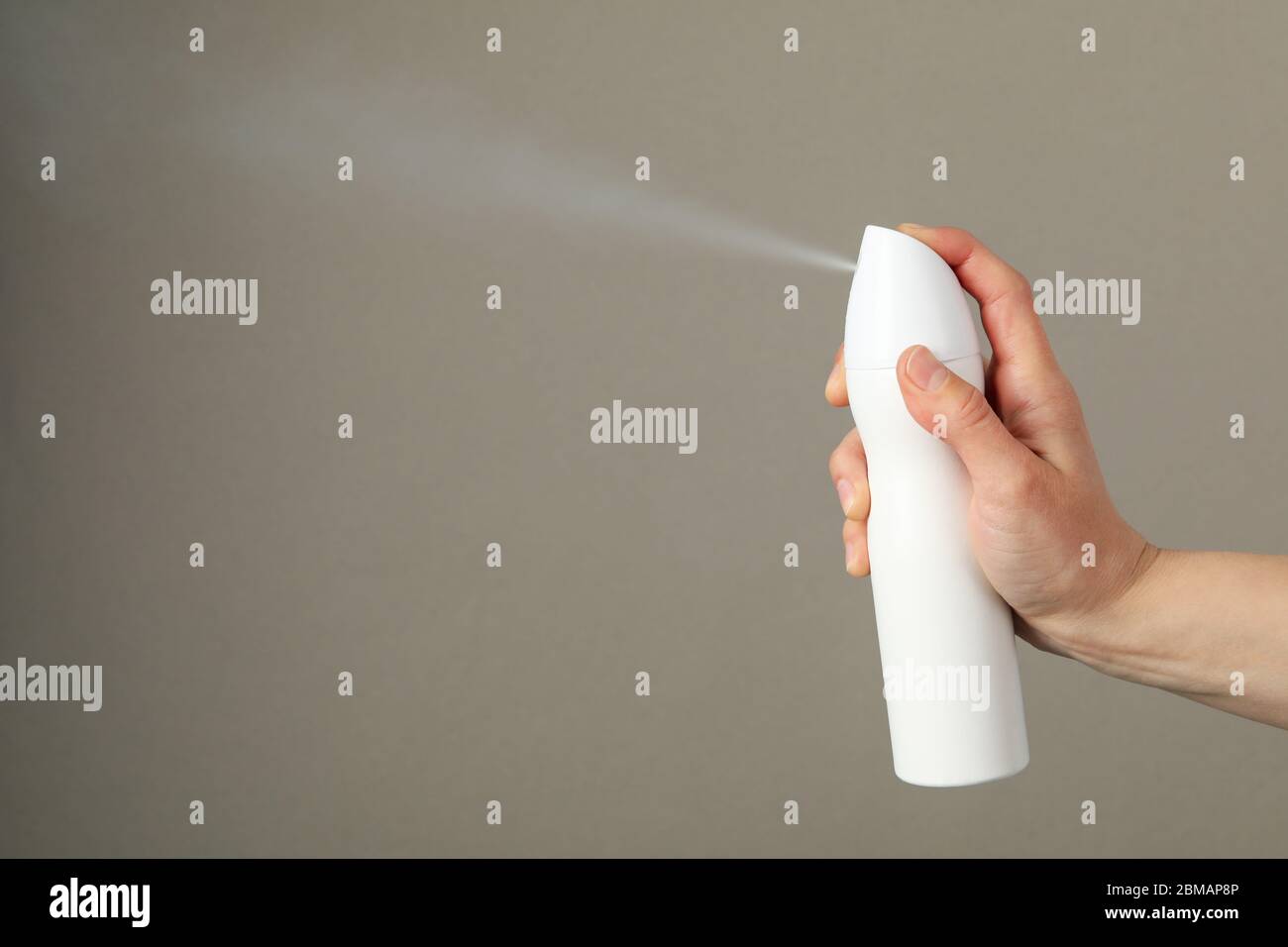 Deodorant spray woman hi-res stock photography and images - Alamy