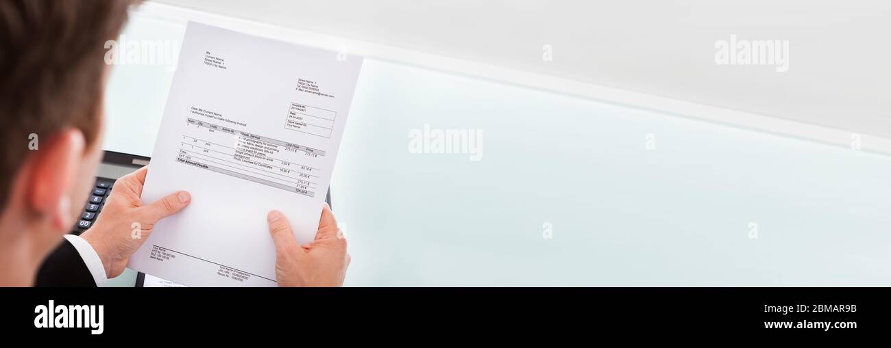 Man Holding In Hand Business Invoice Paper Letter Stock Photo - Alamy
