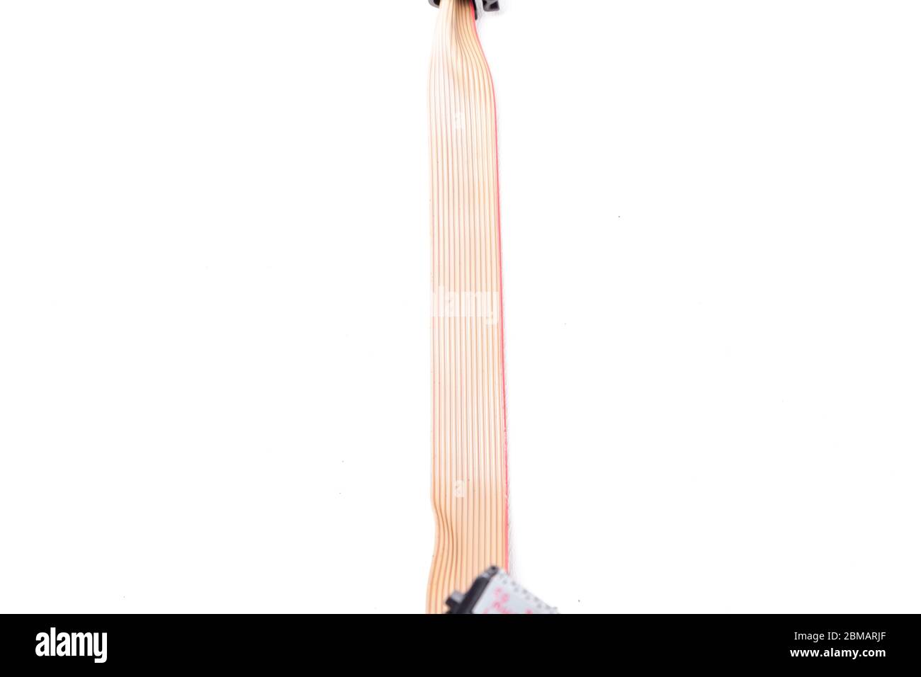 Vertical strip of a loop of electric wires wrapped in yellow and red ...