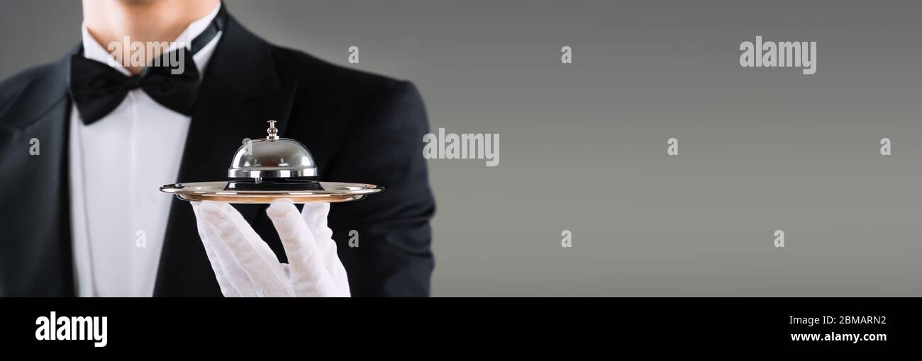 Hand waiter hi-res stock photography and images - Alamy