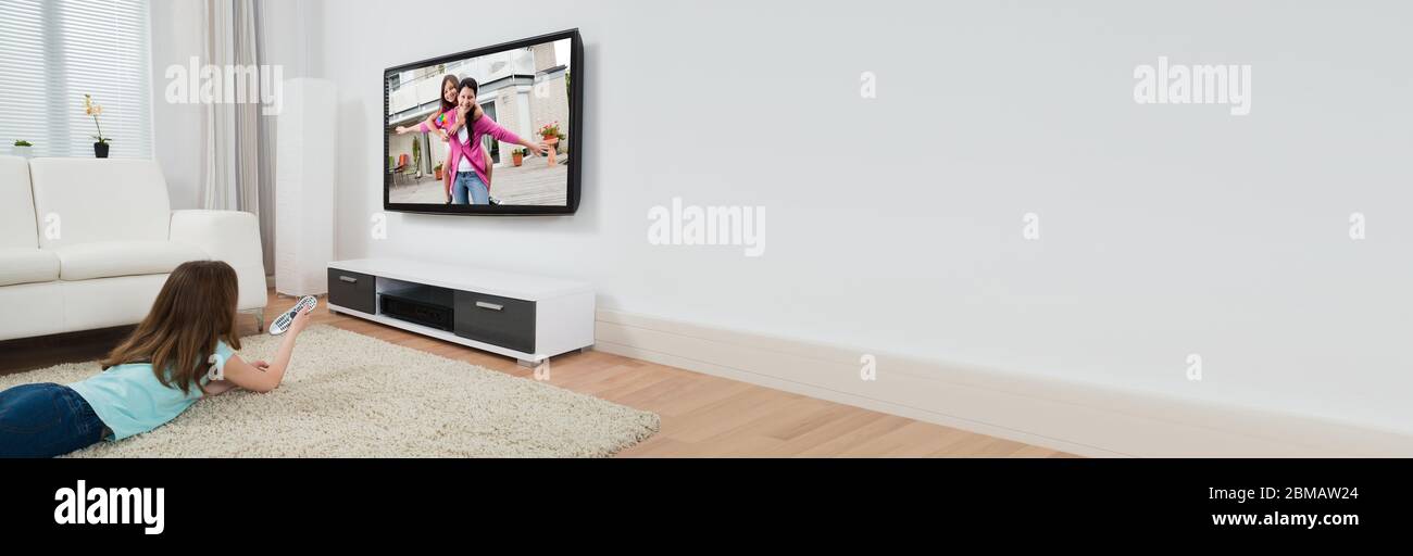 Kid Watching TV On Television Screen In Room Living Stock Photo - Alamy
