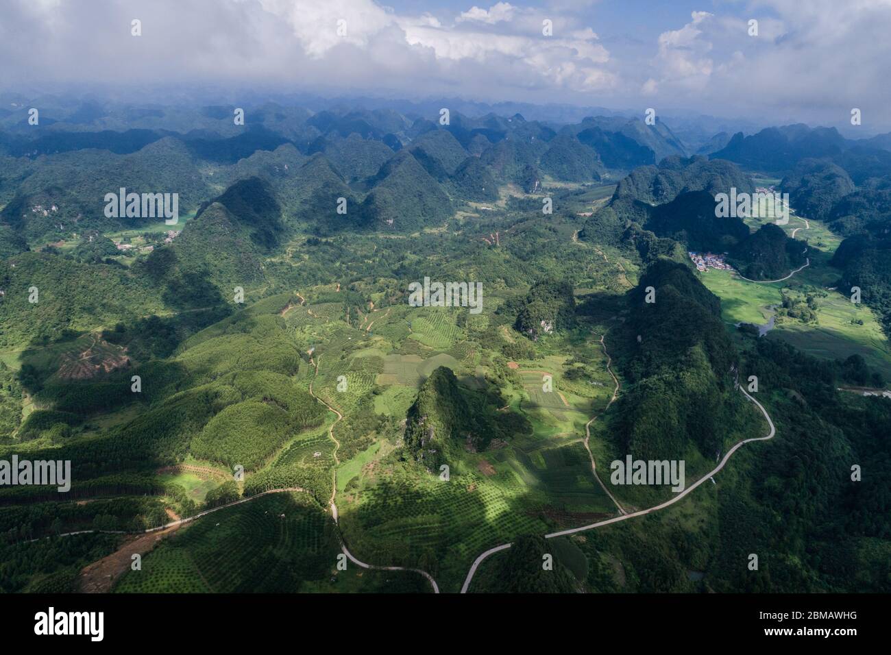 Aerial view of Karst mountains and rice fields Stock Photo - Alamy