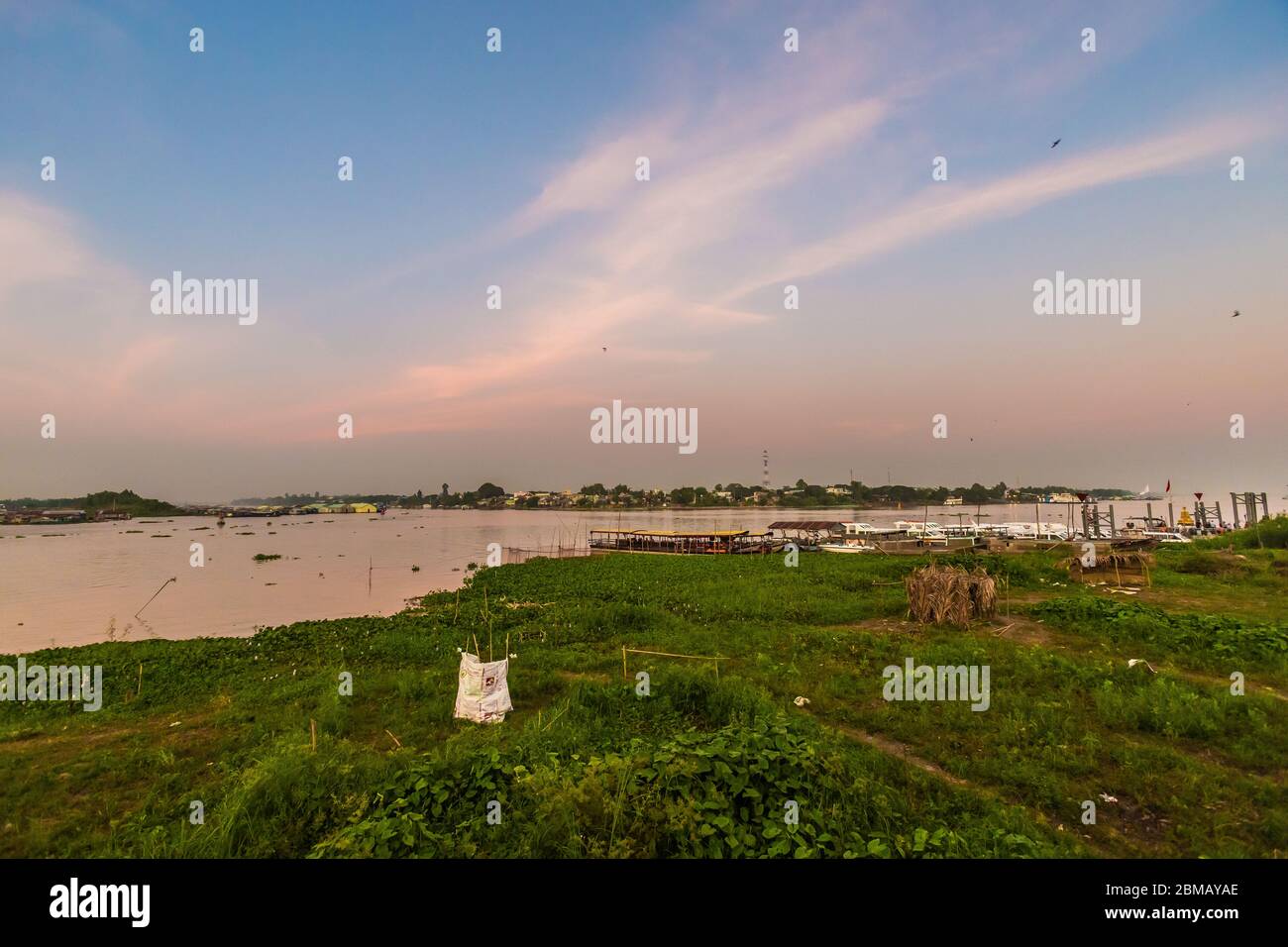Summer sunset in tropical Chau Doc, heart of Mekong Delta, Vietnam ...