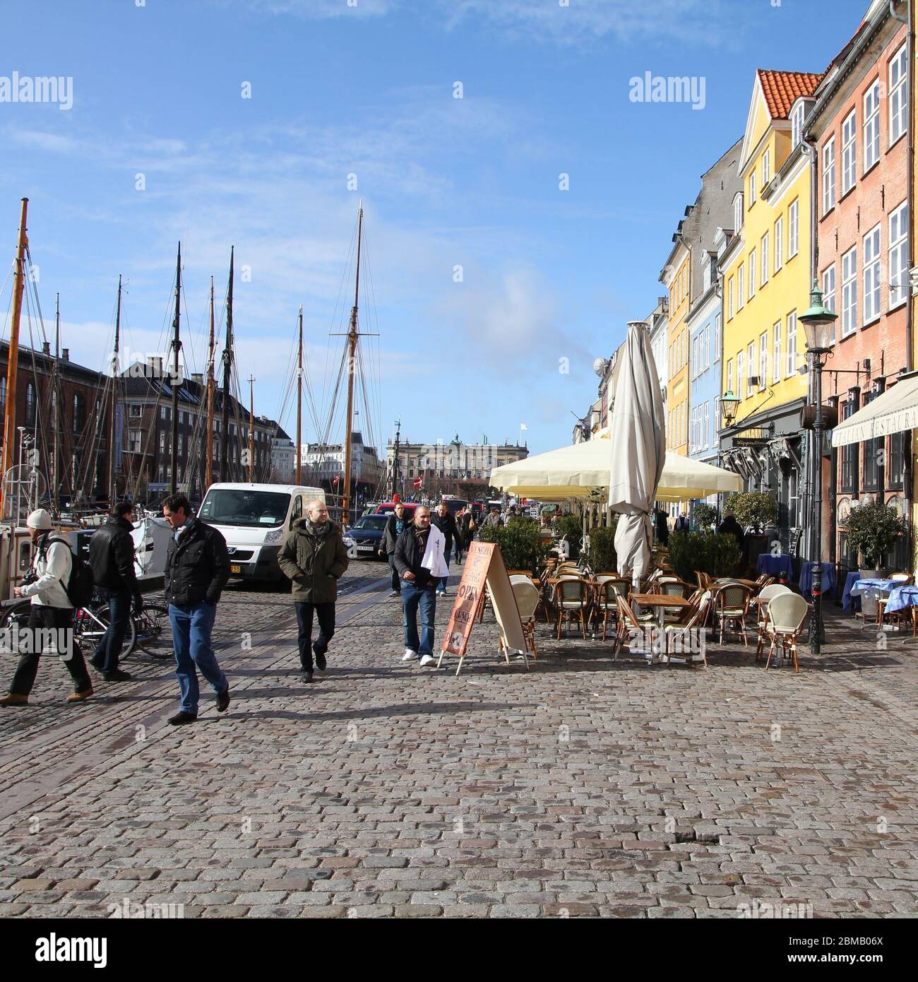 COPENHAGEN - MARCH 11: Tourists in Nyhavn street on March 11, 2011 in ...