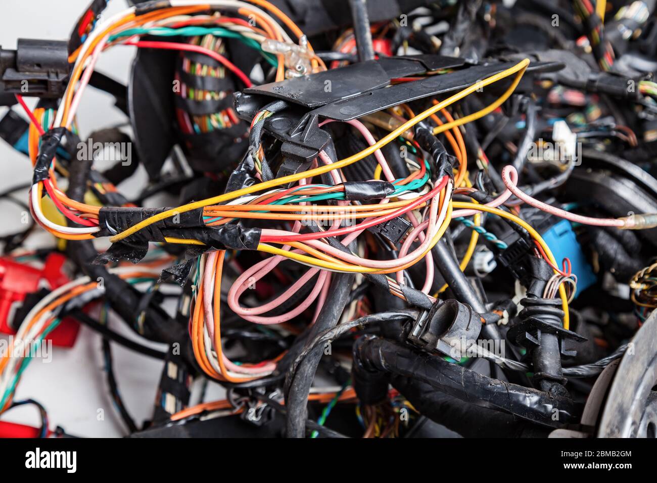 Electrical network of multi-colored wires: yellow, red and green ...