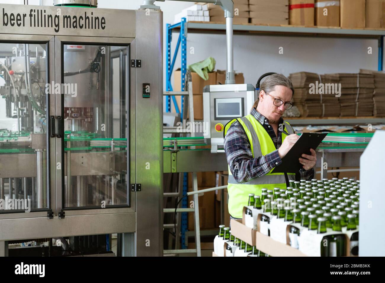 Brewery worker checking product hi-res stock photography and images - Alamy
