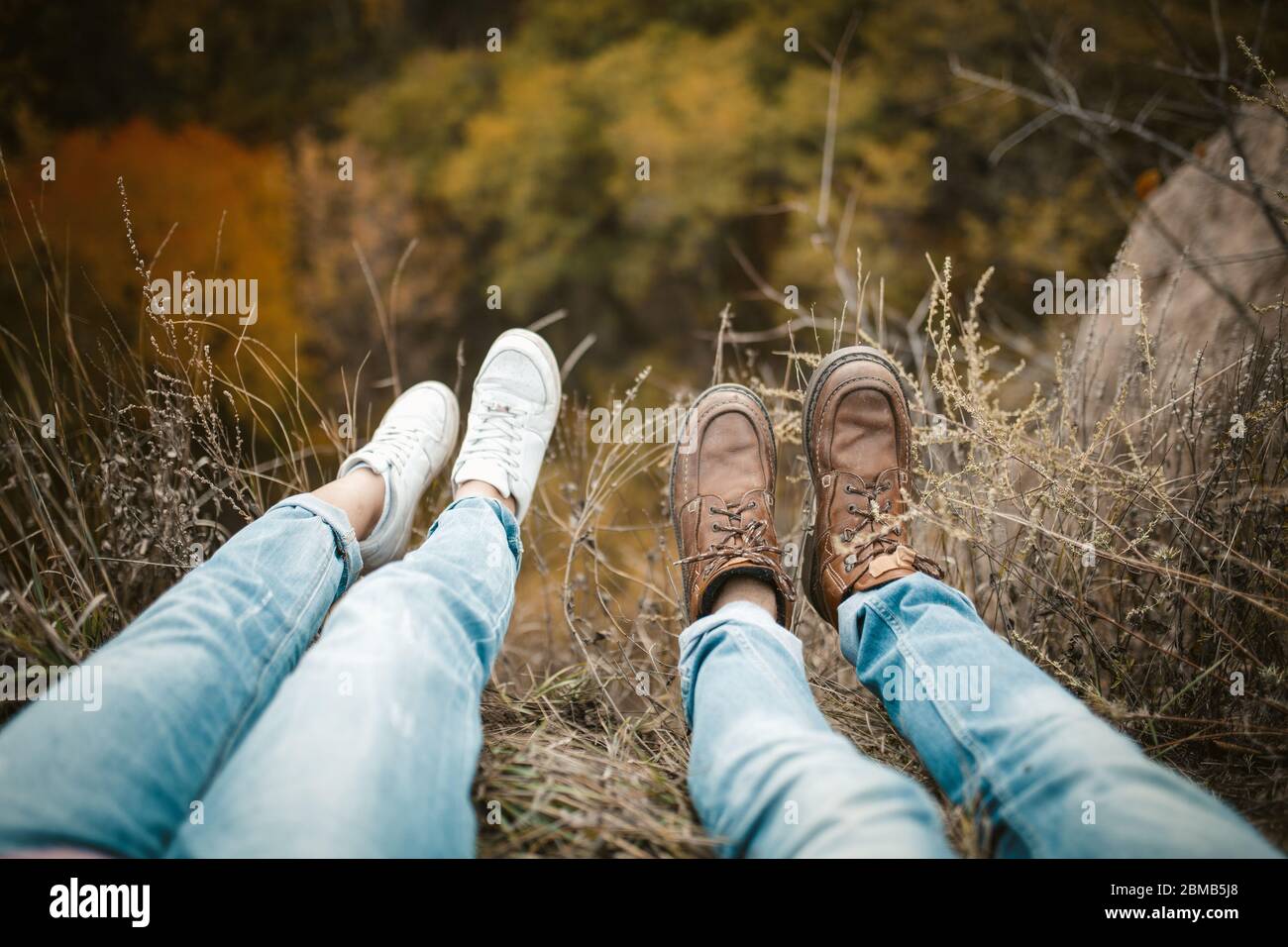 Person sitting down legs hi-res stock photography and images - Alamy