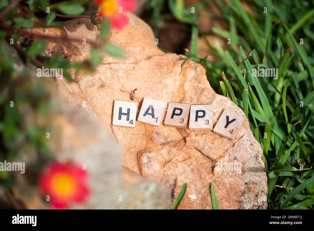 Happy in block letters Stock Photo - Alamy