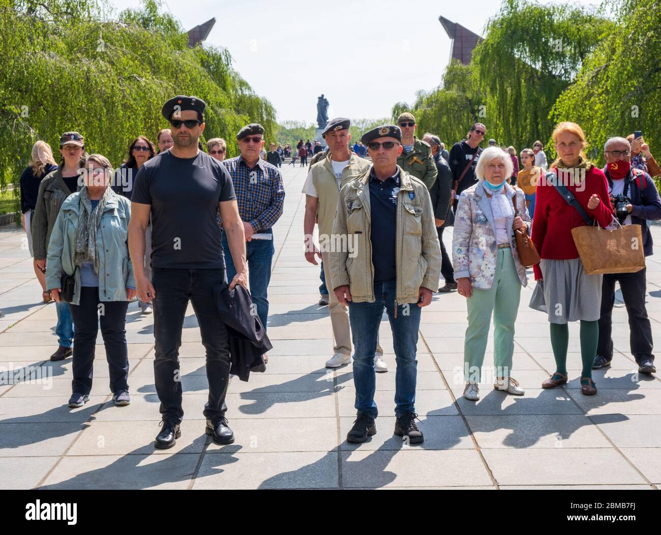 Berlin, Germany. 8th May, 2020. Men wearing caps and insignia of the ...