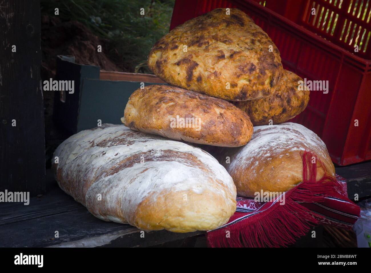 Homemade traditional buns of bread, authentic rustic recipe on counter ...