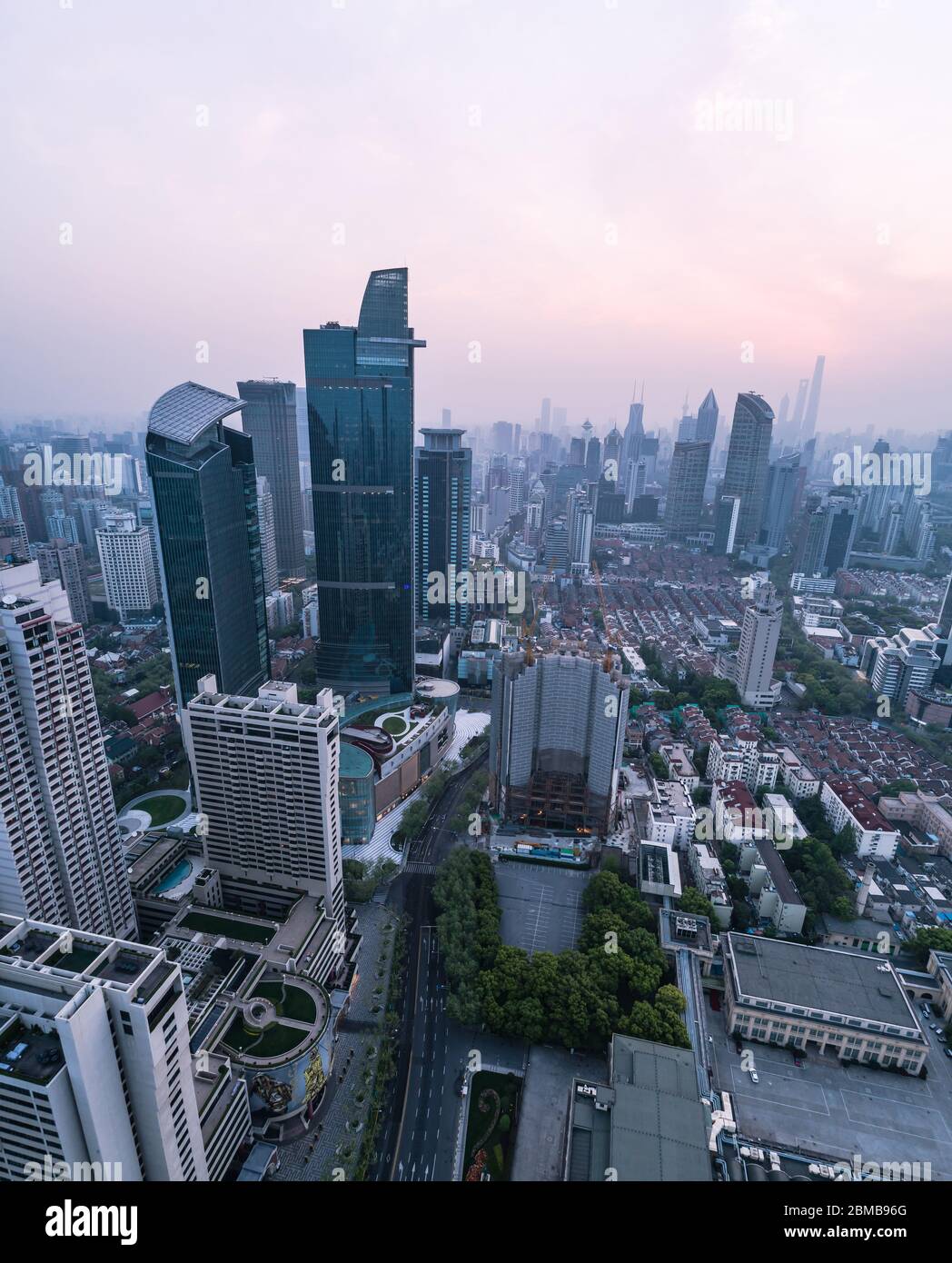 Aerial View of business area and cityscape in foggy dawn, West Nanjing ...