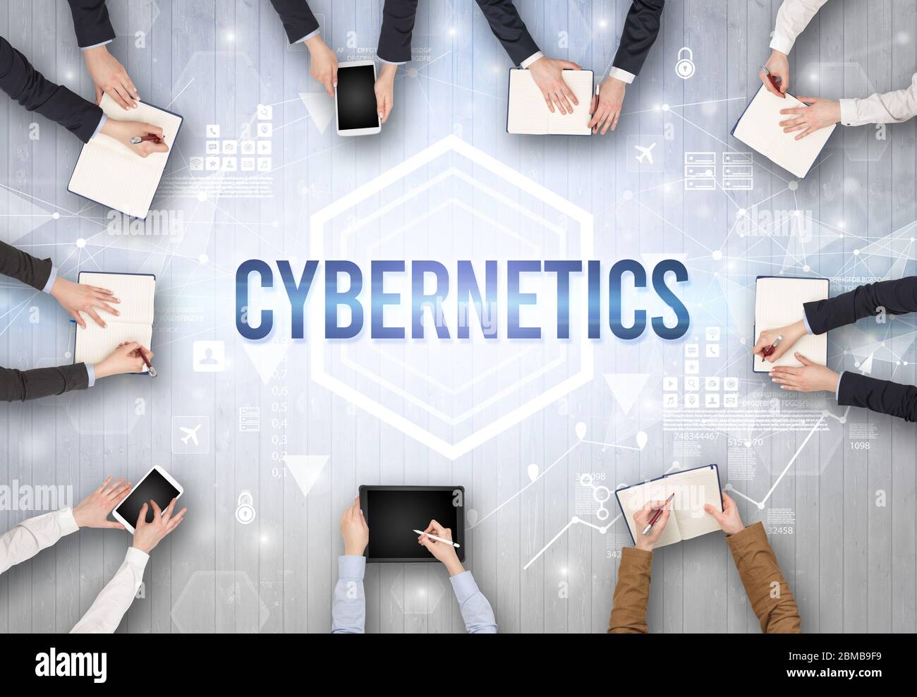 Group of Busy People Working in an Office with CYBERNETICS inscription ...