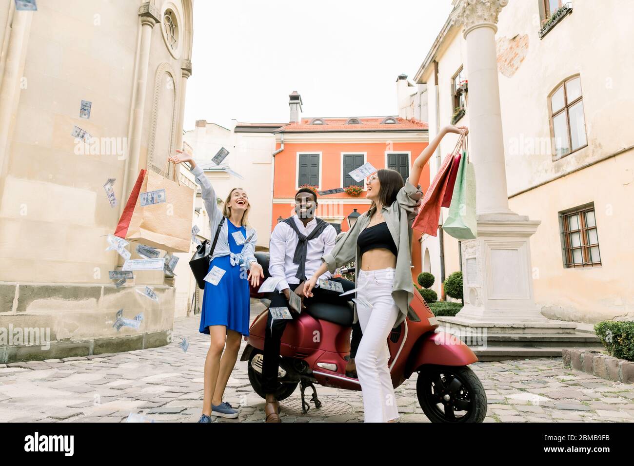 Good-looking young multiethnical friends having fun outdoor in the ...