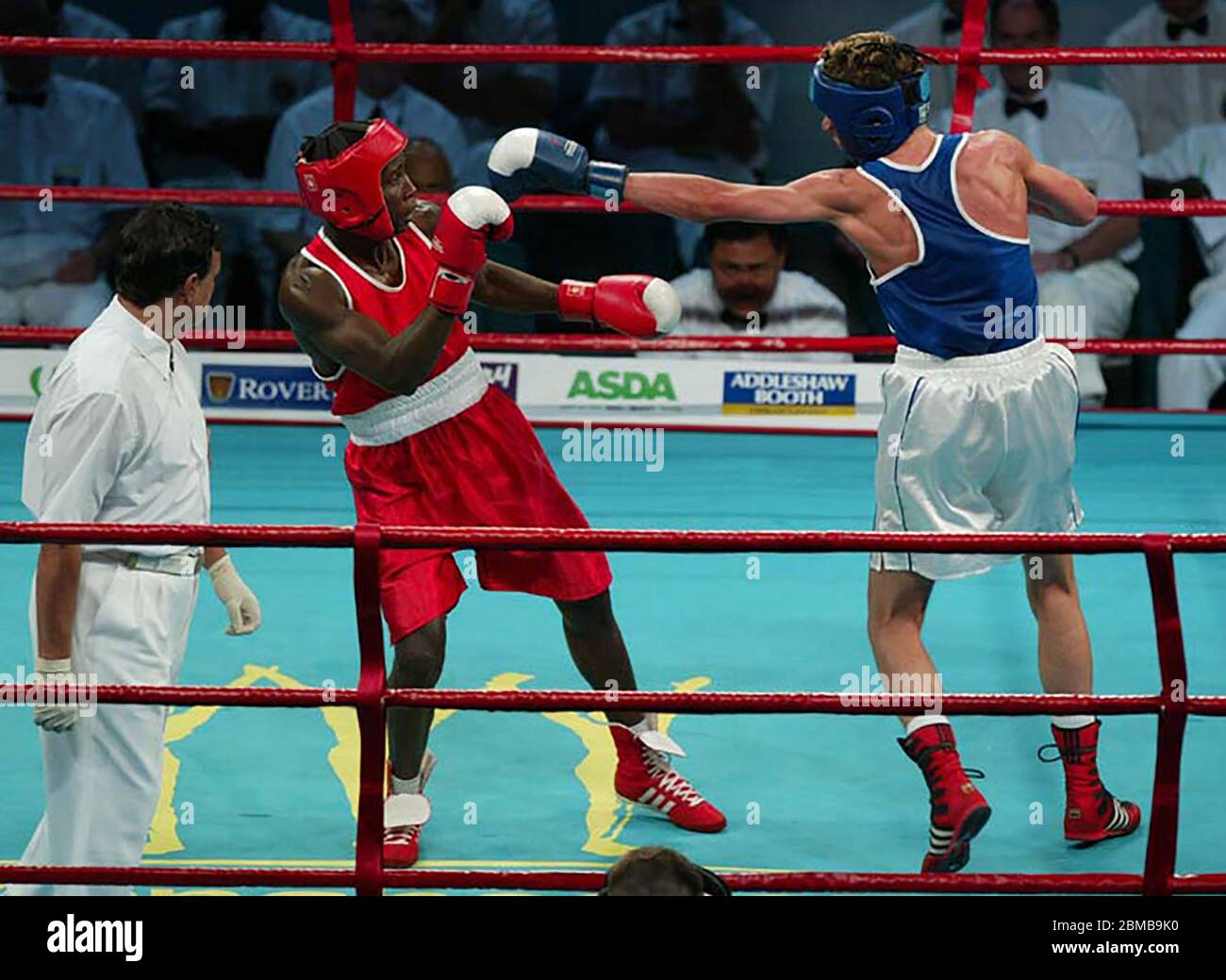 Darren Barker (R), of England, fights in the 63.5Kg boxing final ...