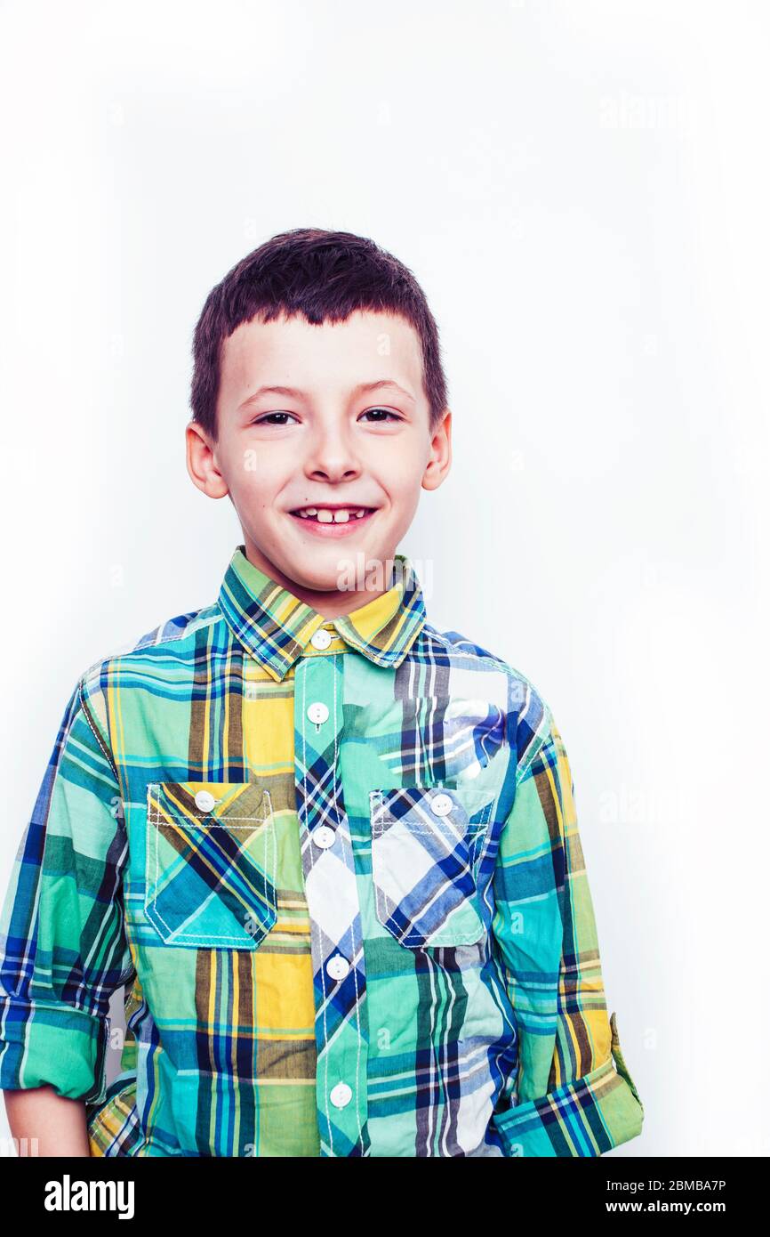 little cute real boy on white background gesture smiling close up ...