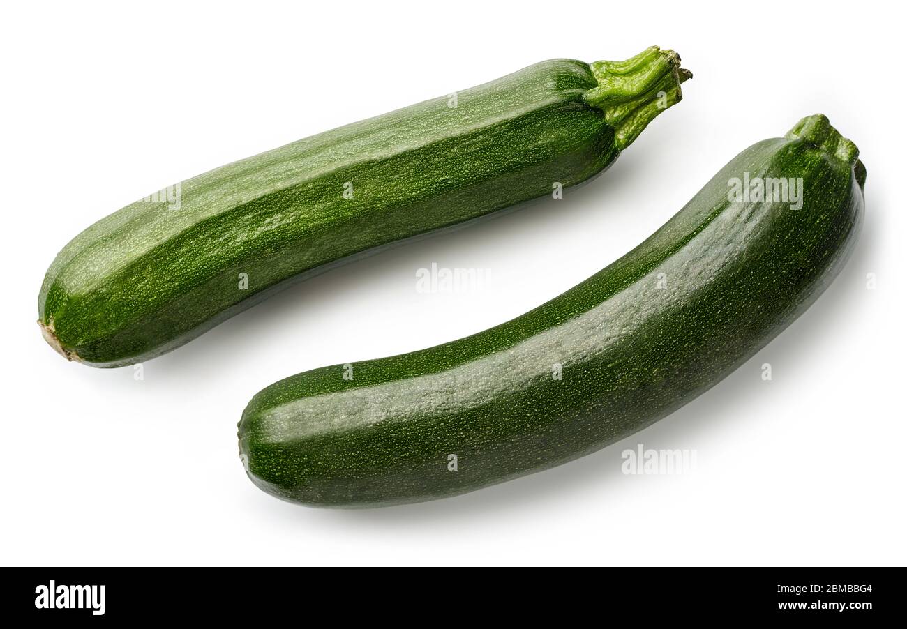 Two fresh whole zucchini isolated on white background. Top view Stock ...