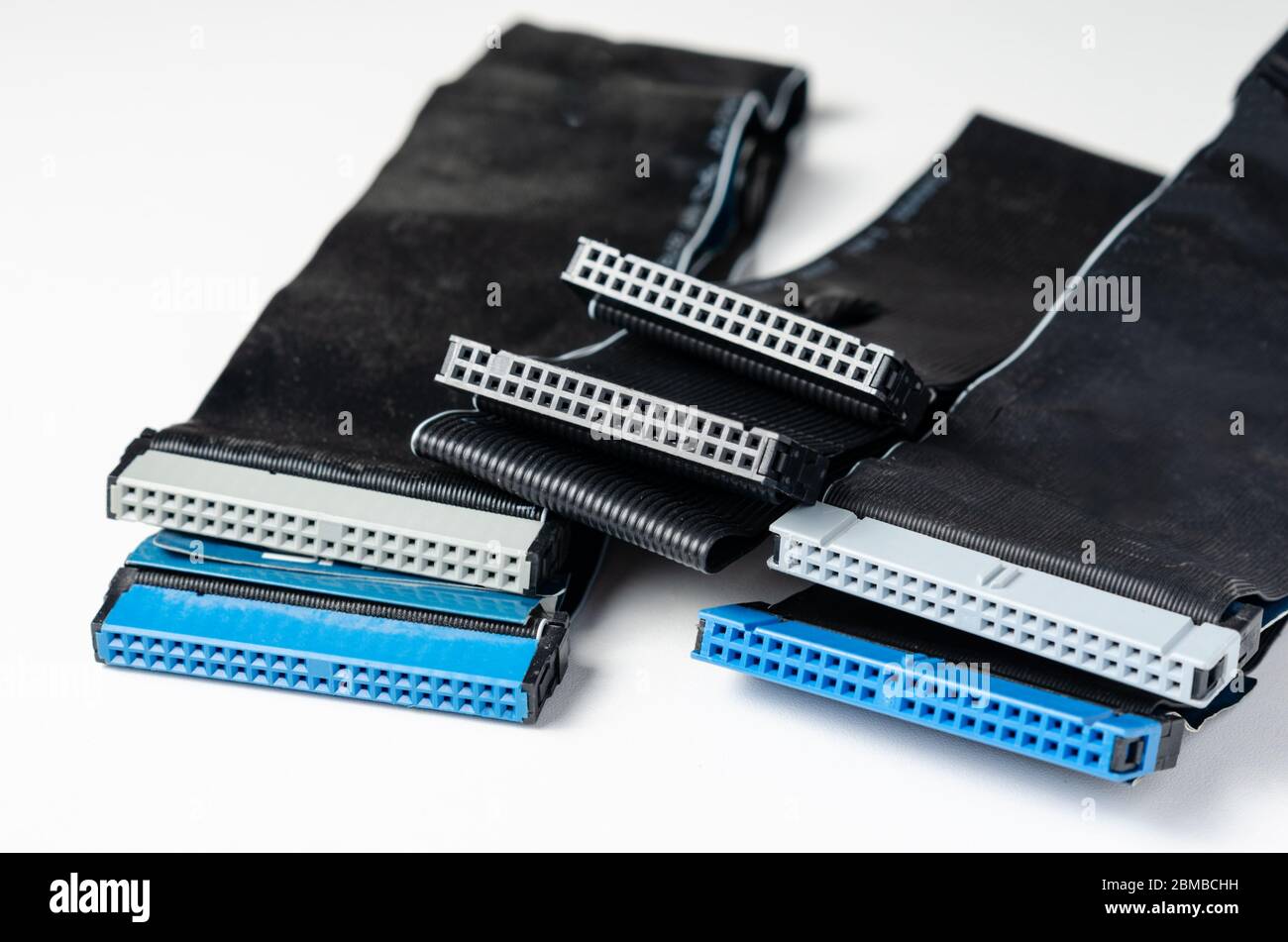 Close-up view of old technology l IDE cables used to connect various ...