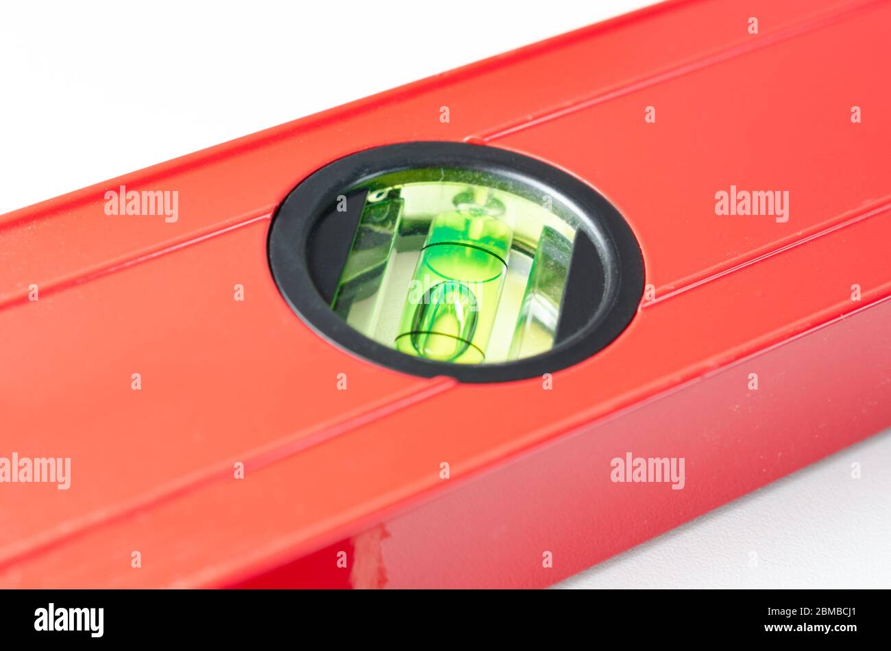Close-up angle view of red Spirit Levels used in construction on white ...