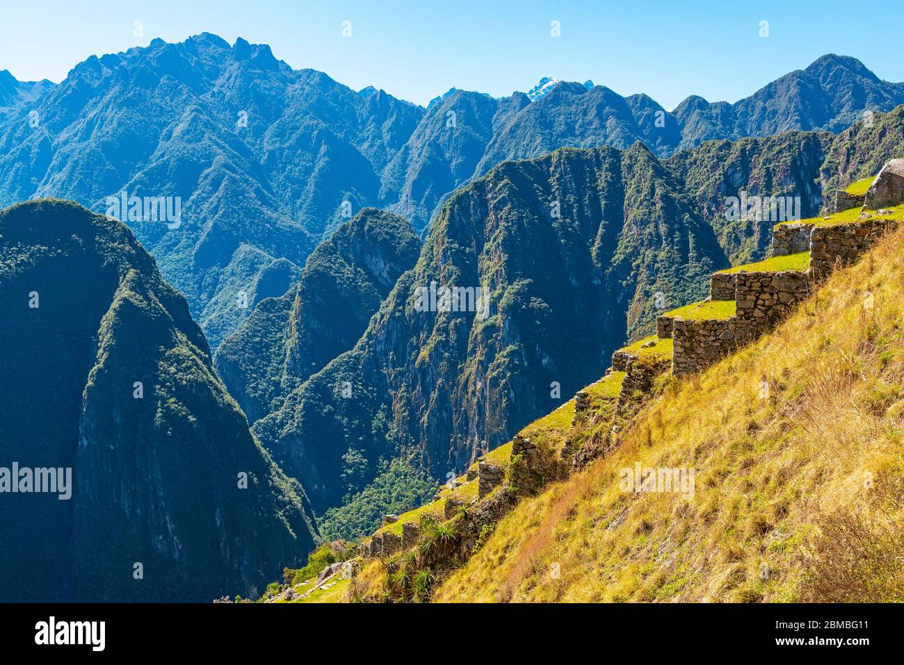 Inca agriculture terraces in the ruin of Machu Picchu with Andes ...