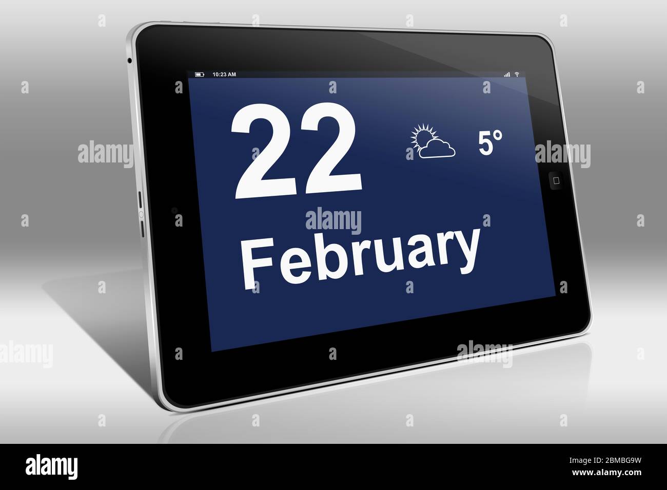 A tablet computer displays a calendar in English language with the date ...