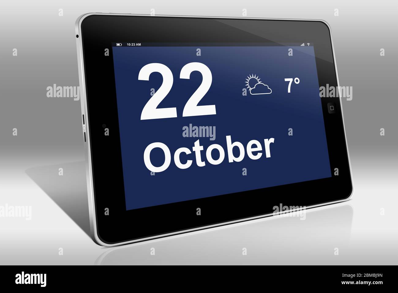 A tablet computer displays a calendar in English language with the date ...