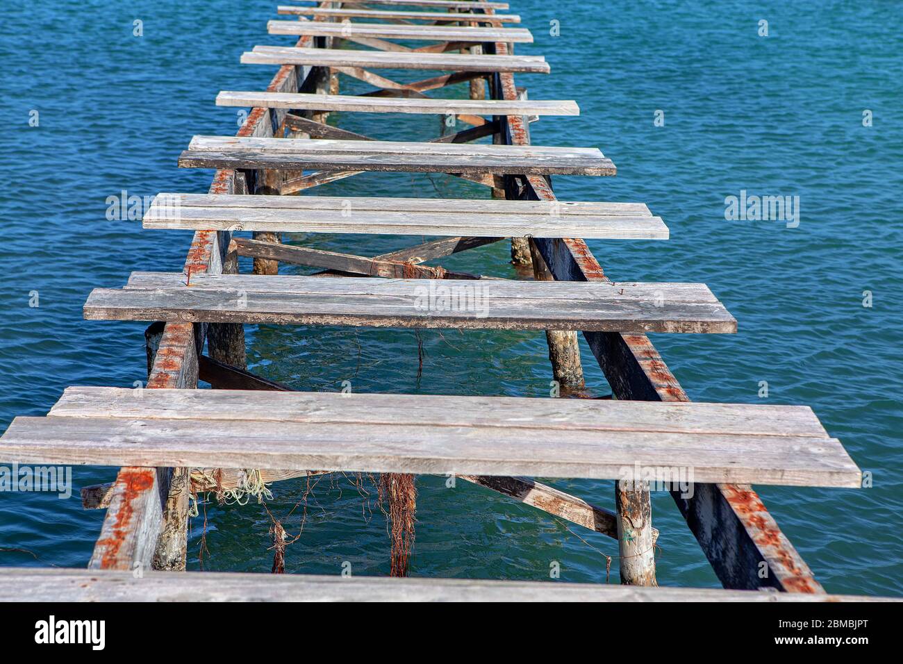 old destroyed river bridge , broken wooden old pier Stock Photo - Alamy