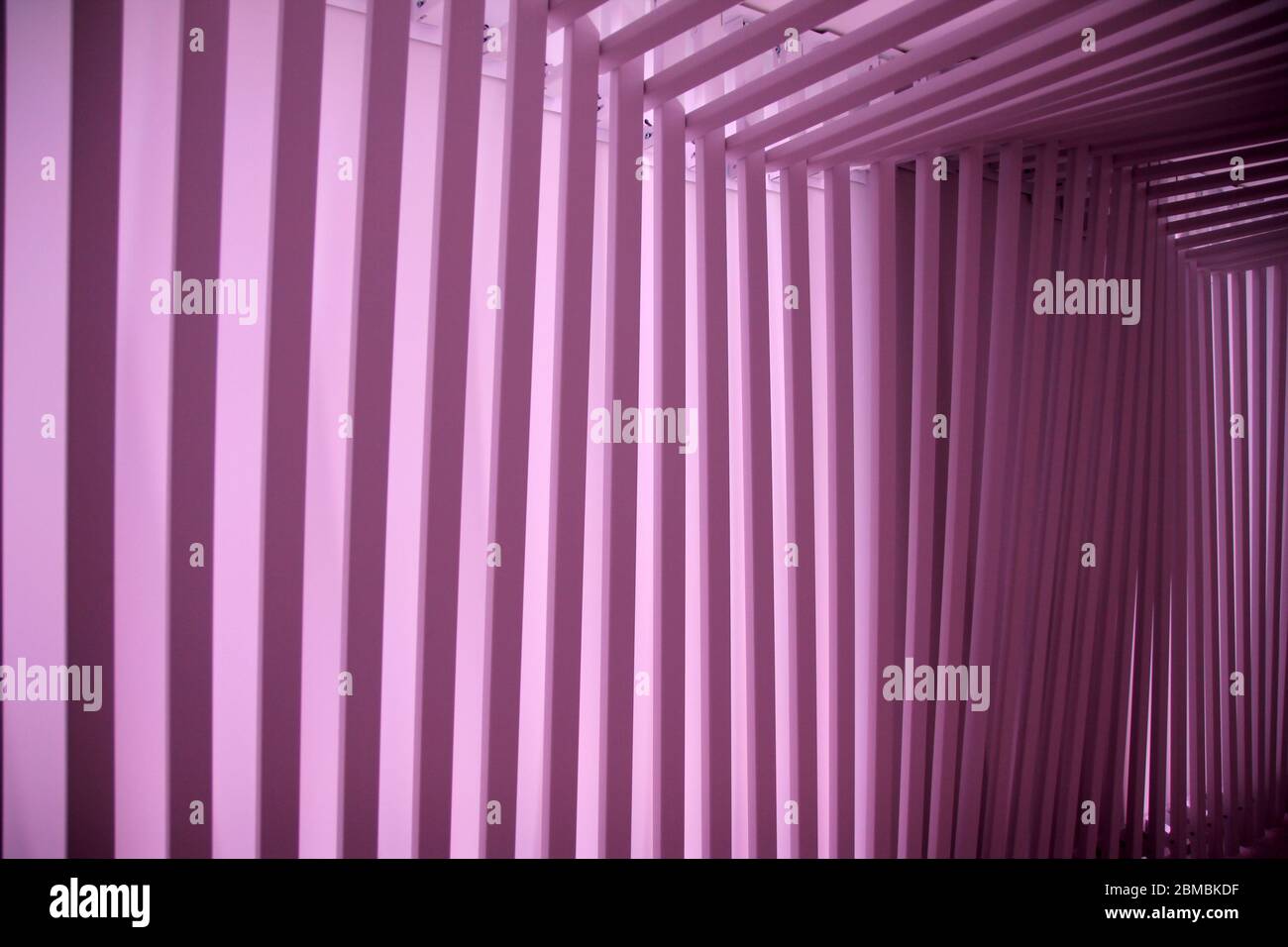 Pink iron artwork with optical illusion Stock Photo - Alamy