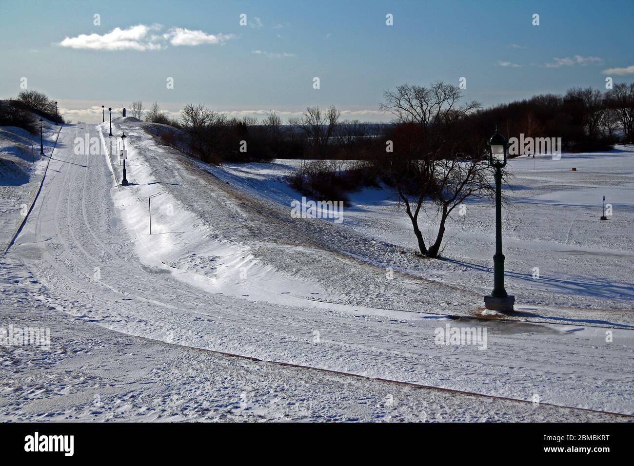Snow iced road in a freezing winter day Stock Photo - Alamy
