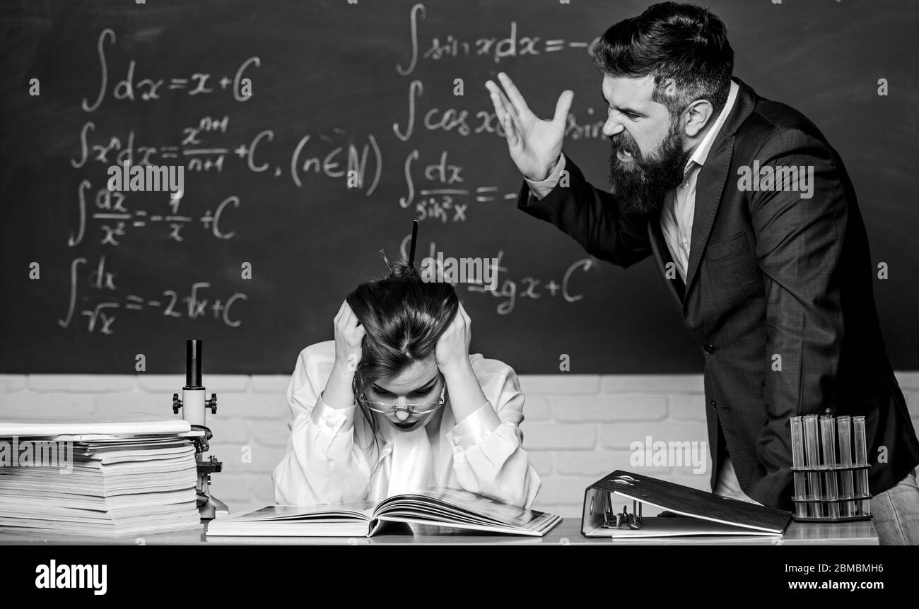 Teacher strict serious bearded man having conflict with student girl ...