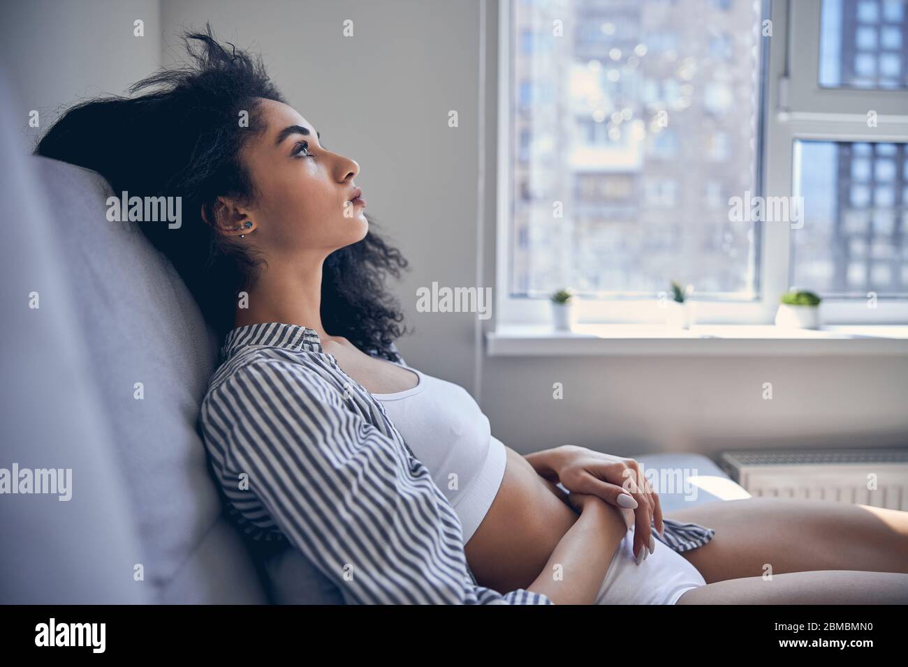 Staring at ceiling hi-res stock photography and images - Alamy