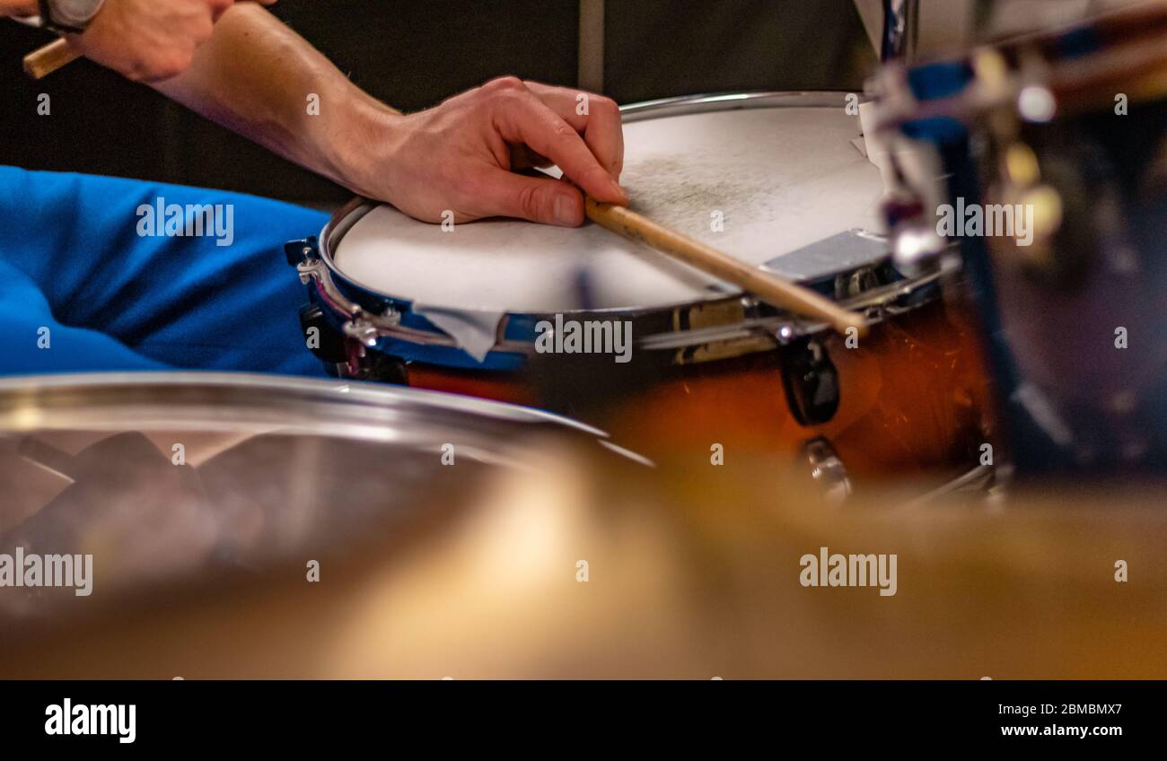 Drum player, musician man recording music on drum set in studio Stock ...