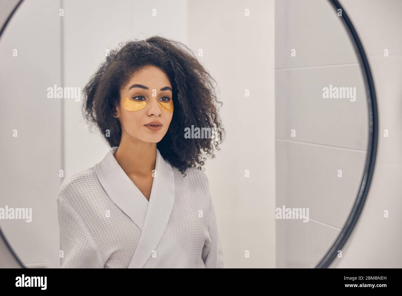 Person staring in mirror hi-res stock photography and images - Alamy