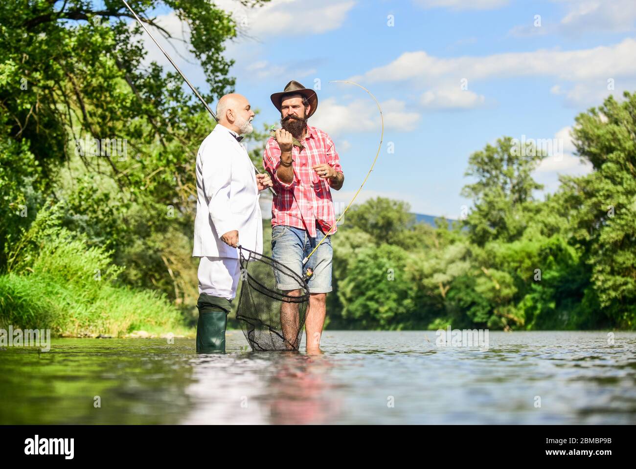 Fishing is not boring for me. friends men with fishing rod and net ...