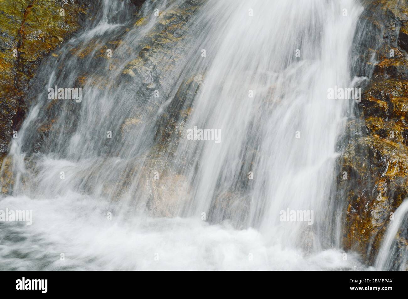 waterfall falling and hit rock splashing to river Stock Photo - Alamy