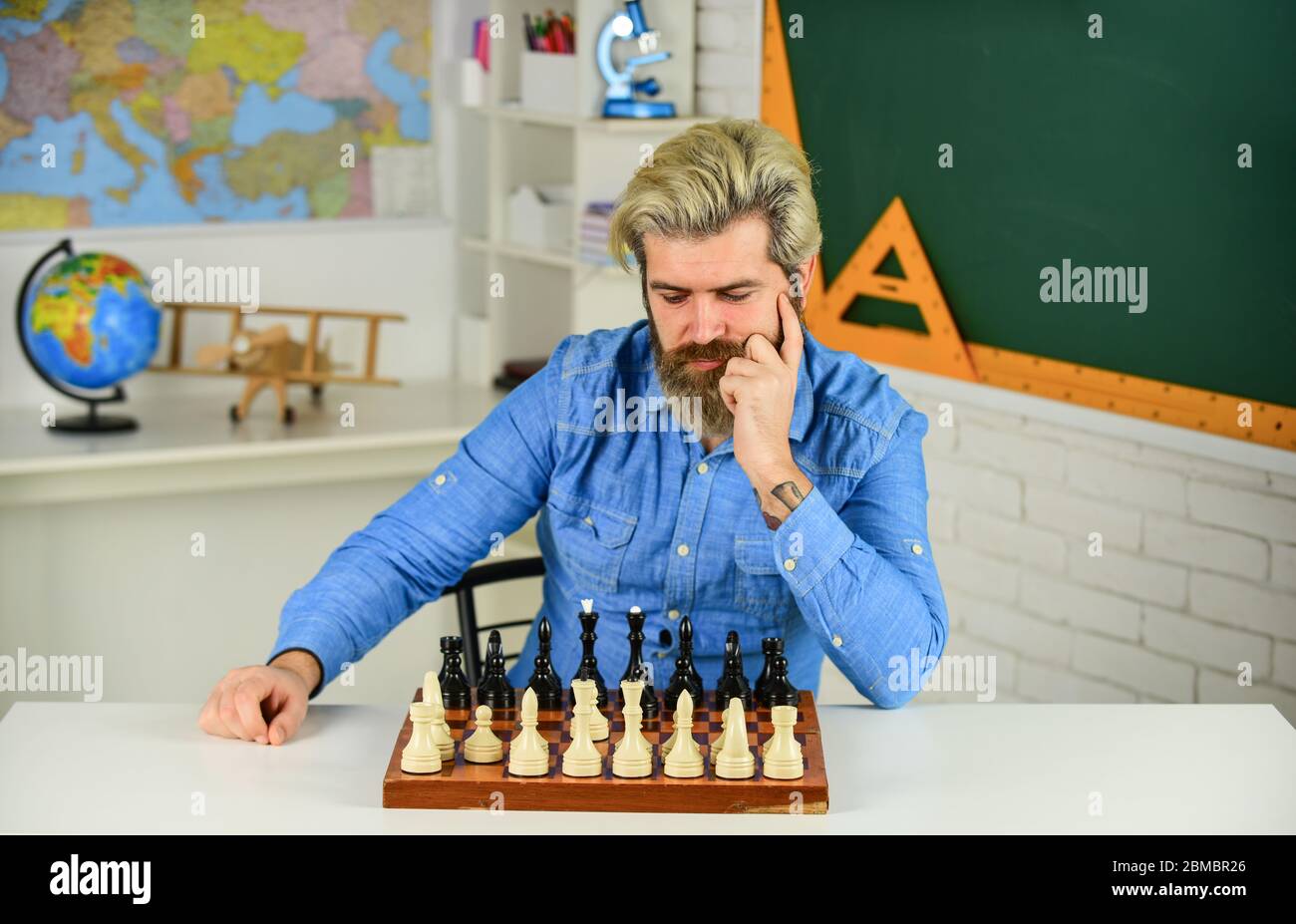 Figures on chess board. Intellectual hobby. Thinking about next step ...